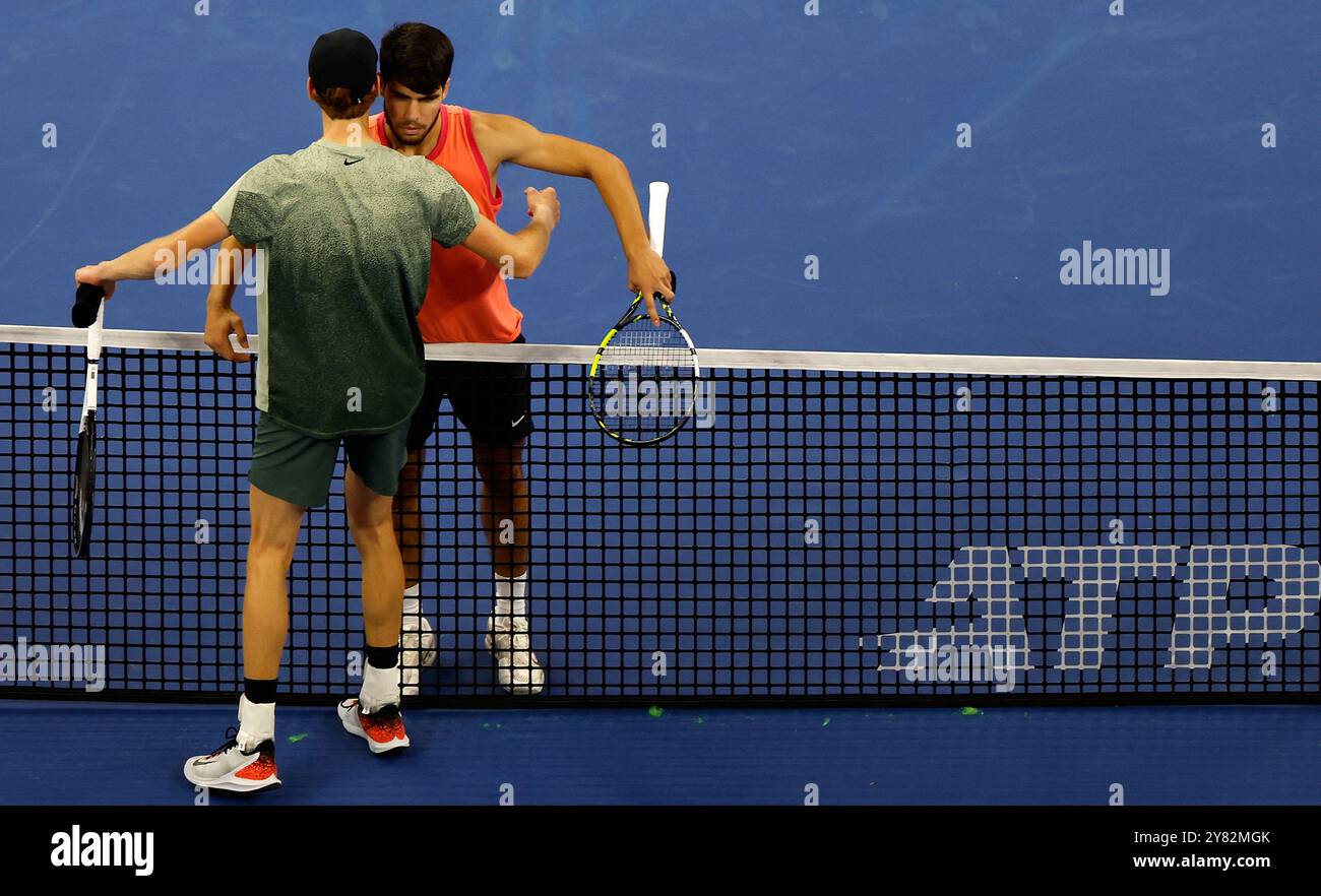 Beijing, China. 2nd Oct, 2024. Carlos Alcaraz (R) of Spain greets ...