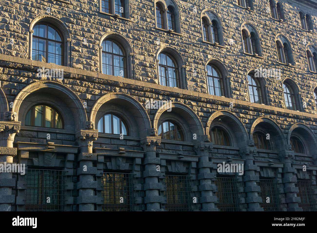 architectural background, dark facade of an old city building, barely ...
