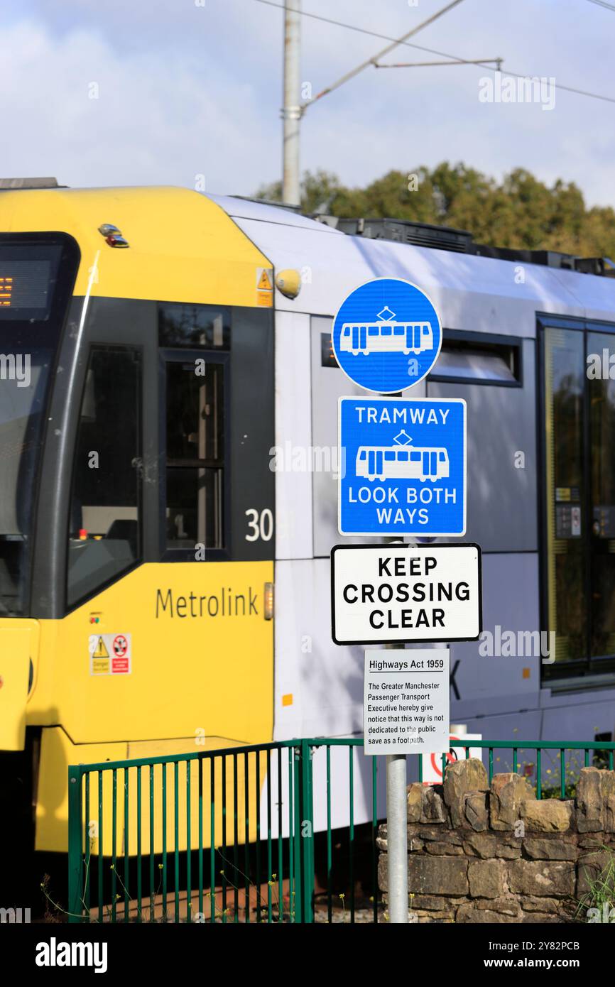 Blue and white tram warning sign at tram tramway with bee network tram ...