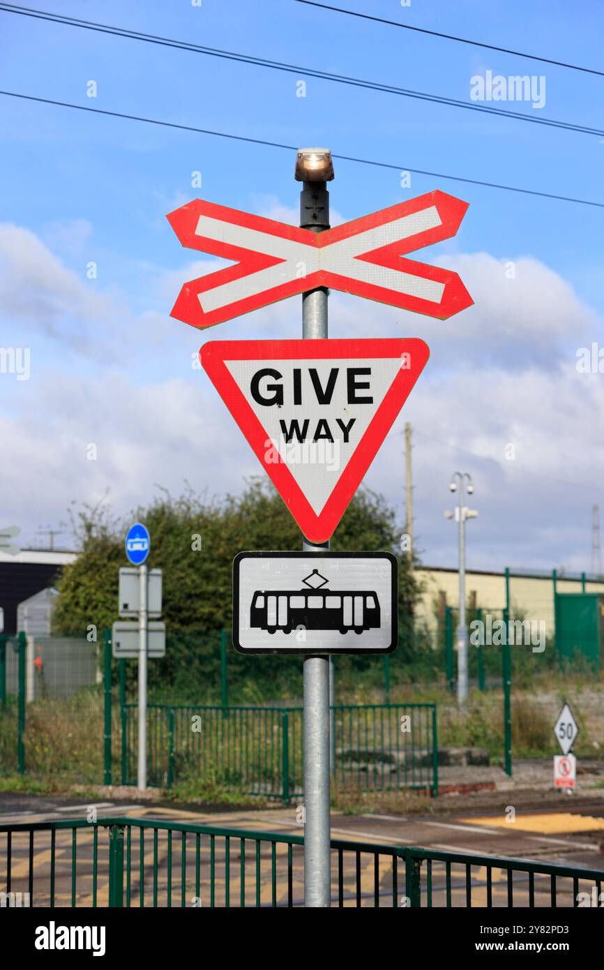 Tram crossing sign, not controlled with gate or barrier, give way ...
