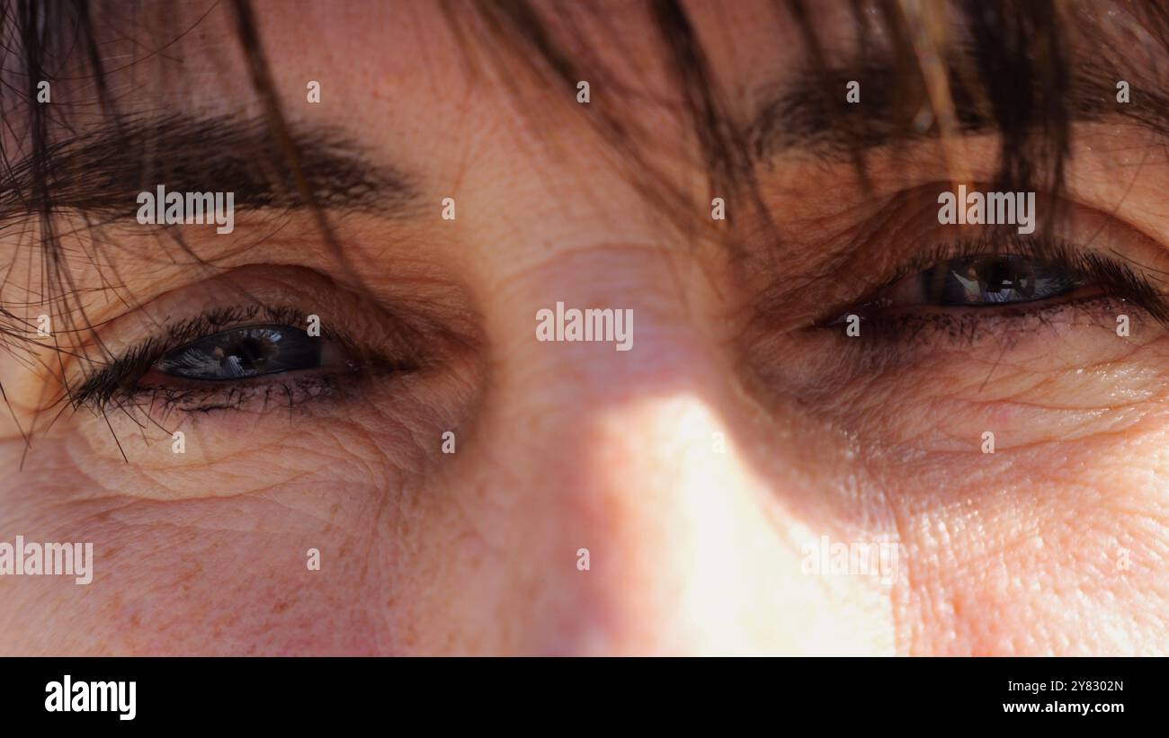 Tired blue eyes female blinking hi-res stock photography and images - Alamy