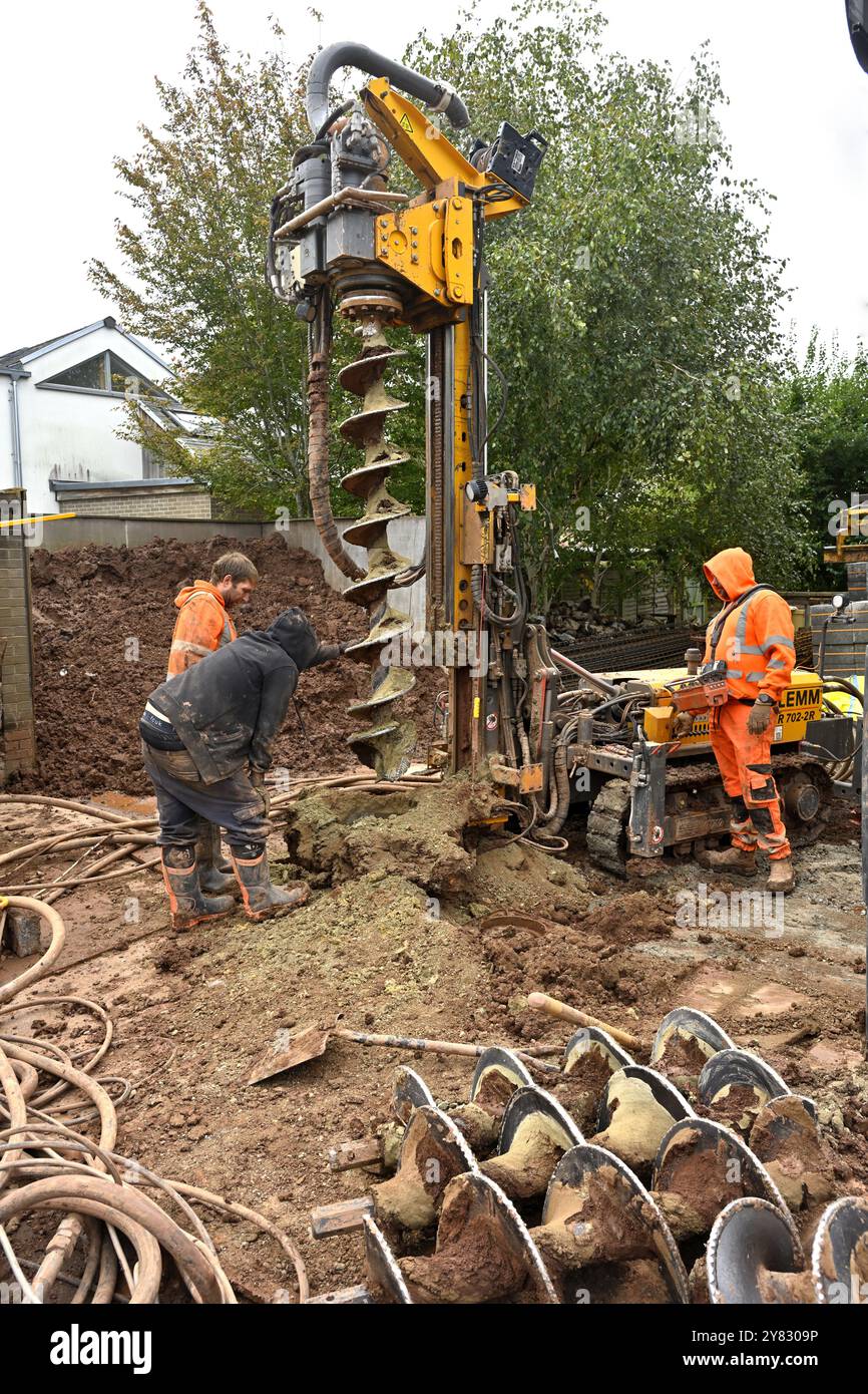 Auger pile drilling hole in clay soil on domestic construction site to ...