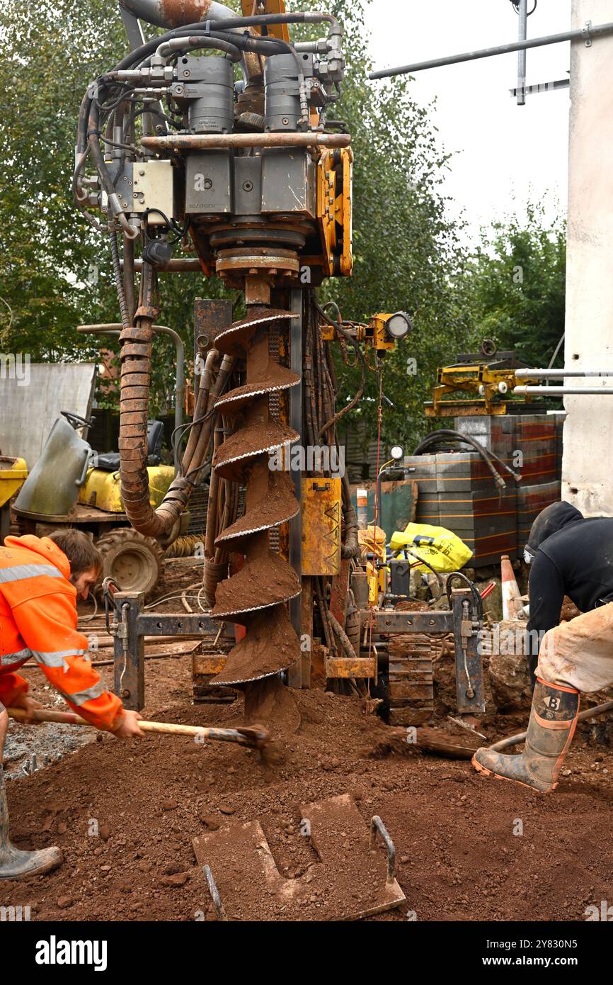 Auger pile drilling hole in clay soil on domestic construction site to ...
