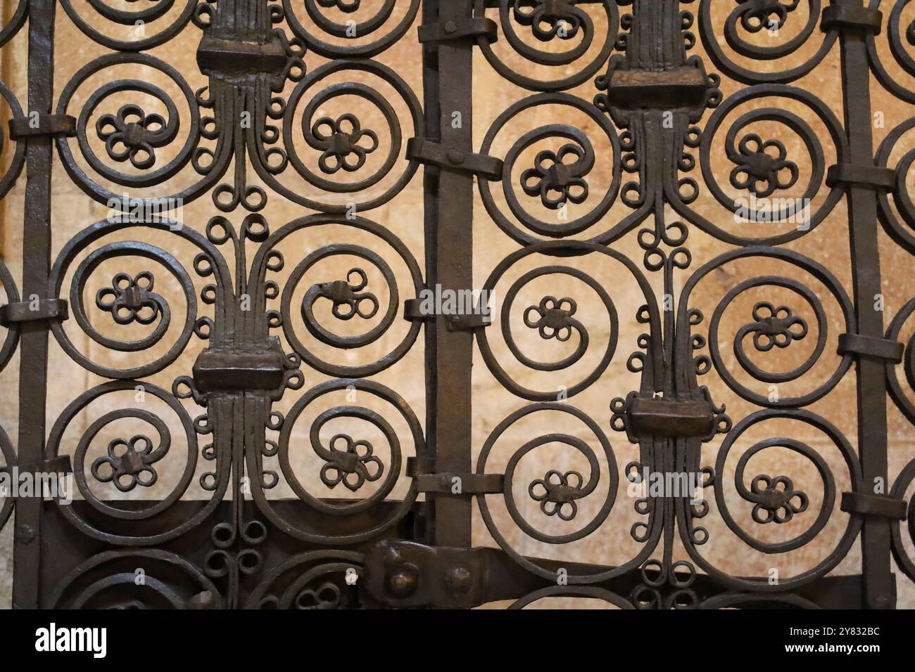 Avila, Castilla y Leon, Spain- August 18, 2024: Wrought iron fence ...