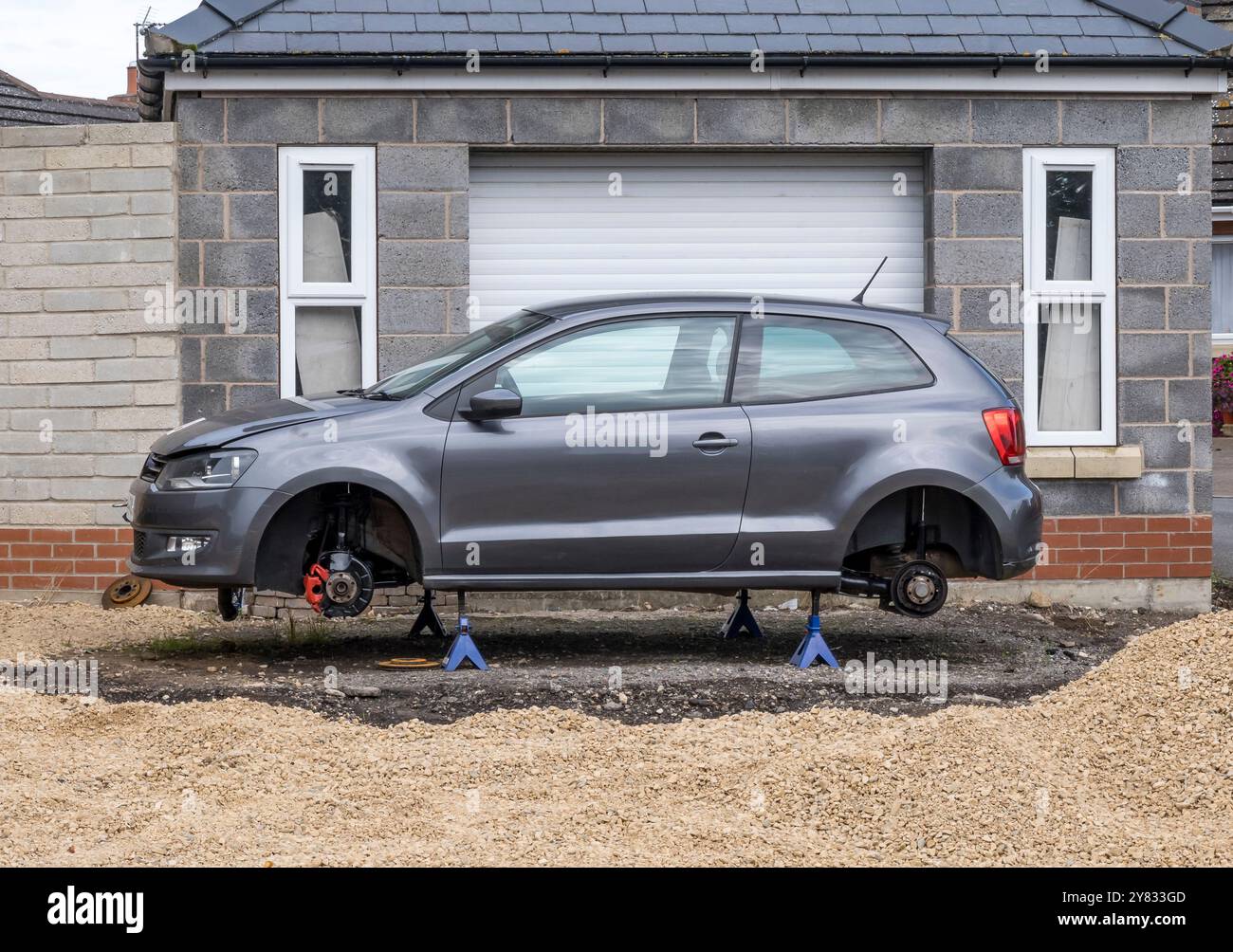 Car supported on axle stands hi-res stock photography and images - Alamy