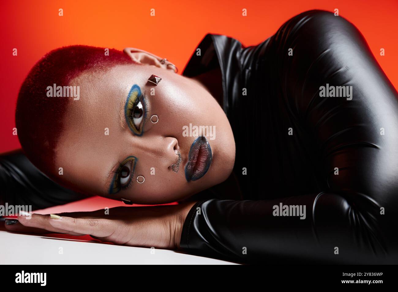 The young woman flaunts her bold, colorful style with pink hair ...