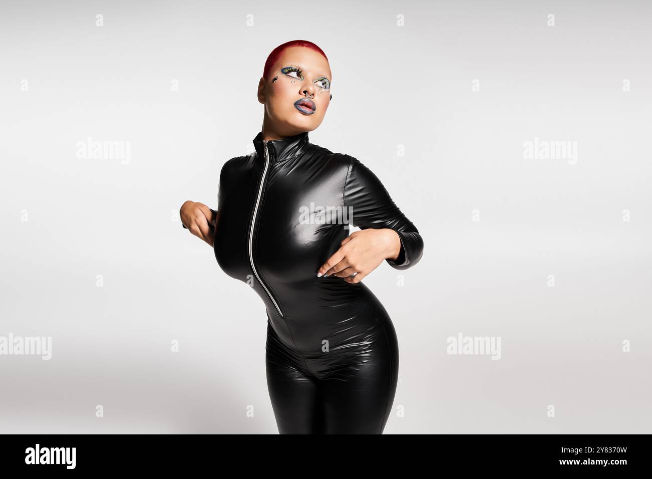 The young woman confidently displays her unique fashion sense in a ...