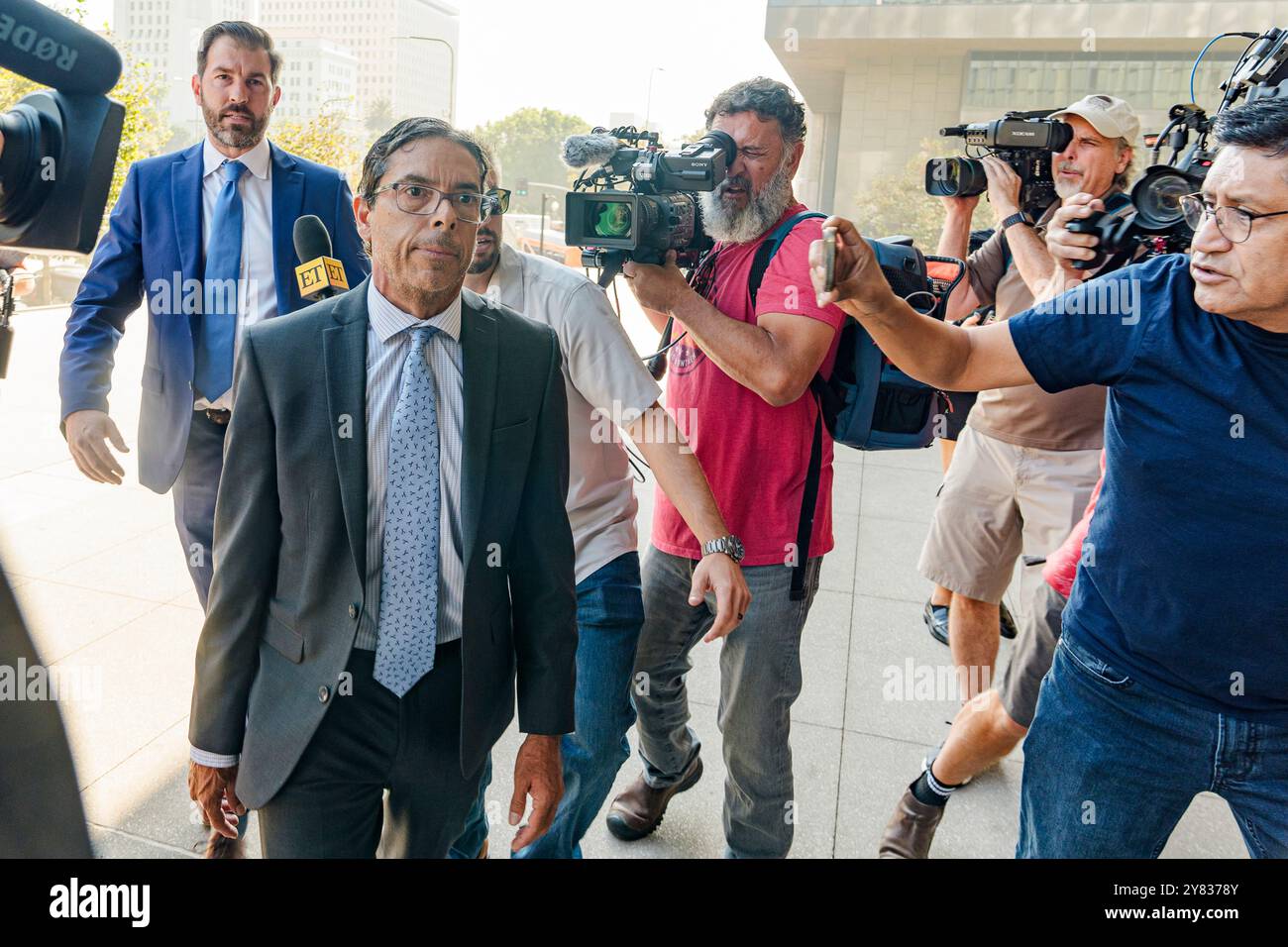 Dr. Mark Chavez, a physician from San Diego, second from left, who is ...
