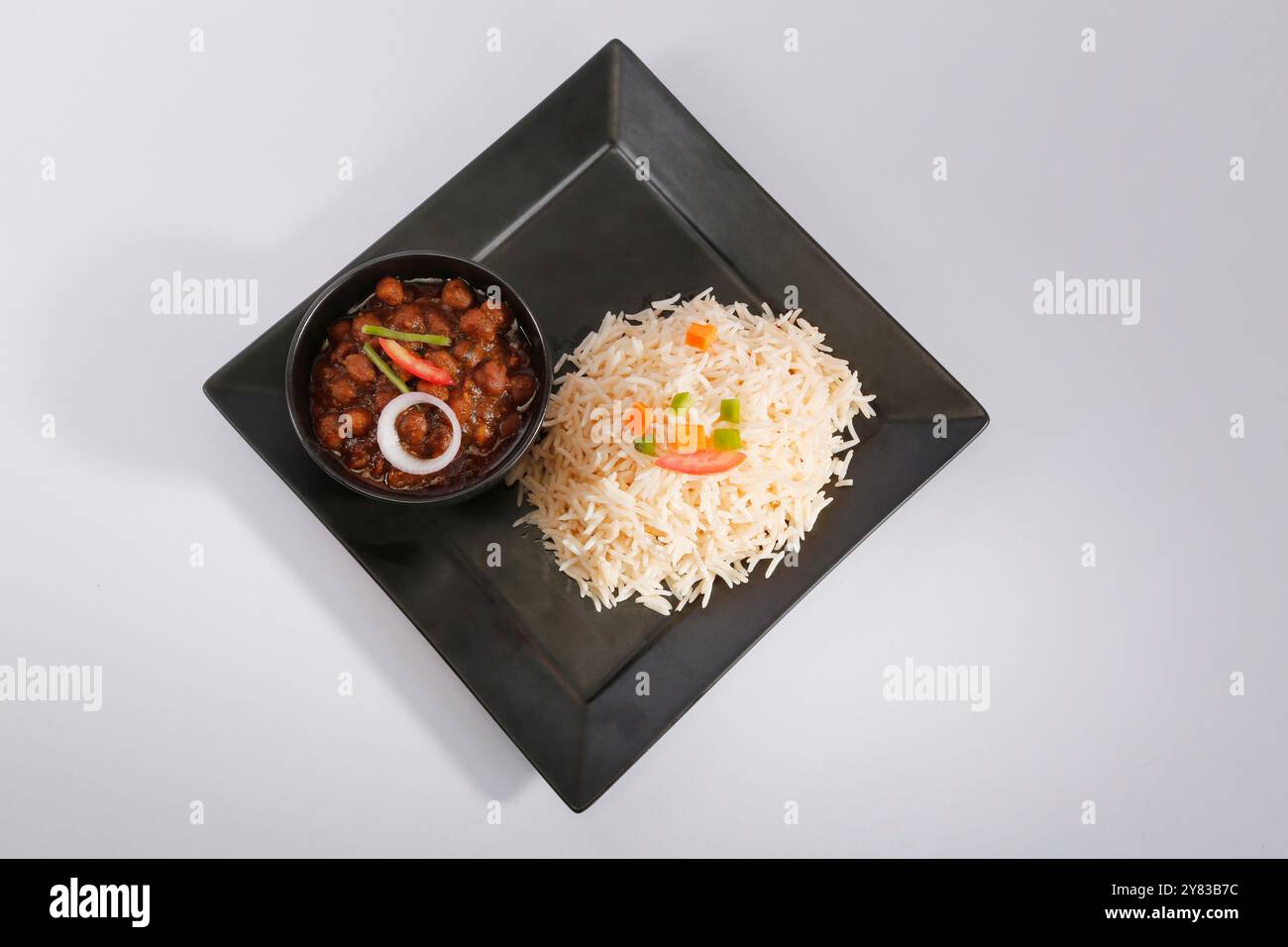 Chole Chawal or Chana Masala With Veg Pulao, Indian dish Stock Photo ...