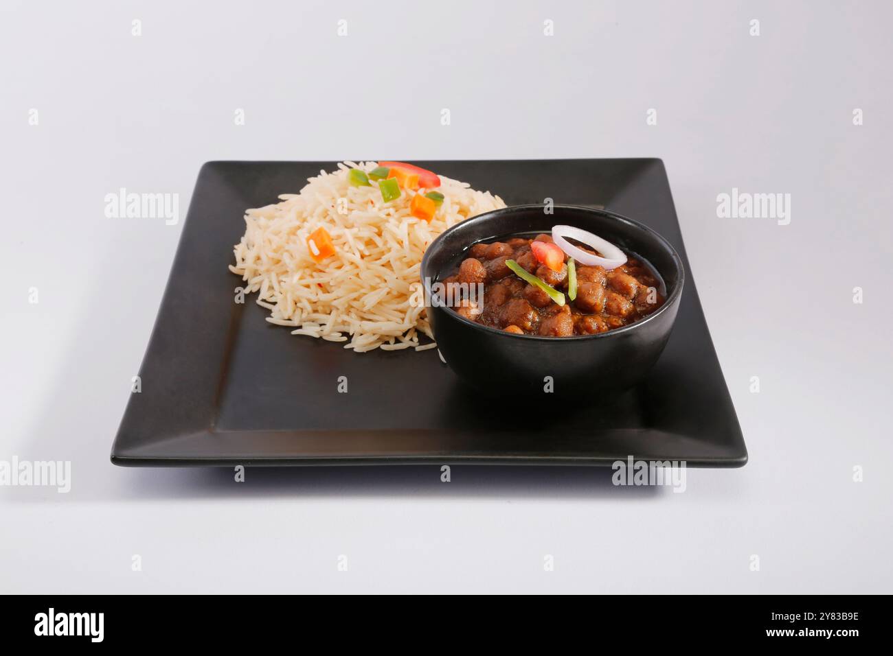 Chole Chawal or Chana Masala With Veg Pulao, Indian dish Stock Photo ...