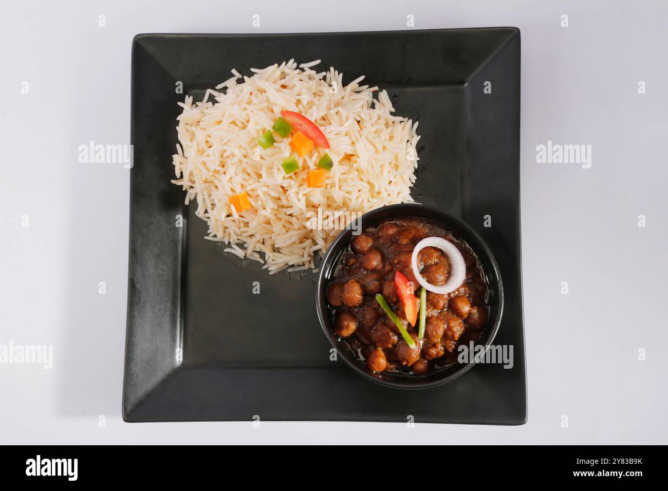 Chole Chawal or Chana Masala With Veg Pulao, Indian dish Stock Photo ...