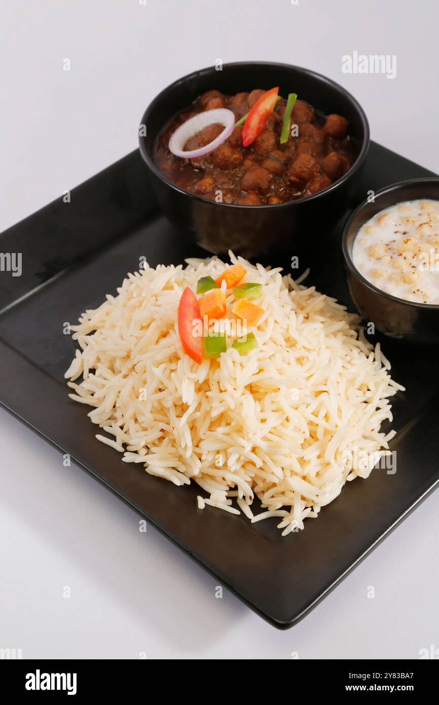 Chole Chawal or Chana Masala With Veg Pulao, Indian dish Stock Photo ...