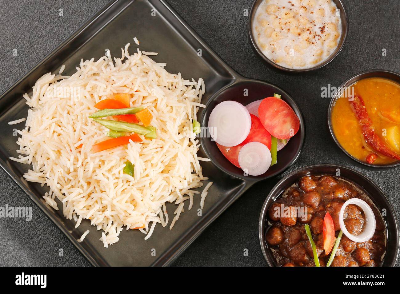 Chole Chawal or Chana Masala With Veg Pulao,Raita, Indian dish Stock ...