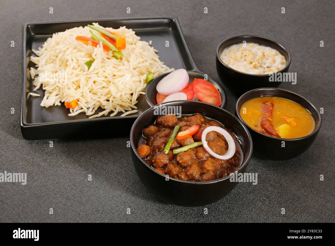 Chole Chawal or Chana Masala With Veg Pulao,Raita, Indian dish Stock ...