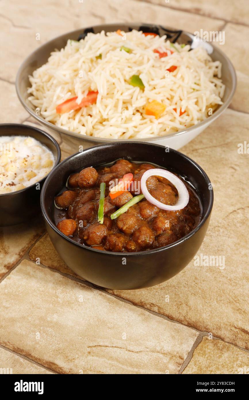 Chole Chawal or Chana Masala With Veg Pulao, Indian dish Stock Photo ...