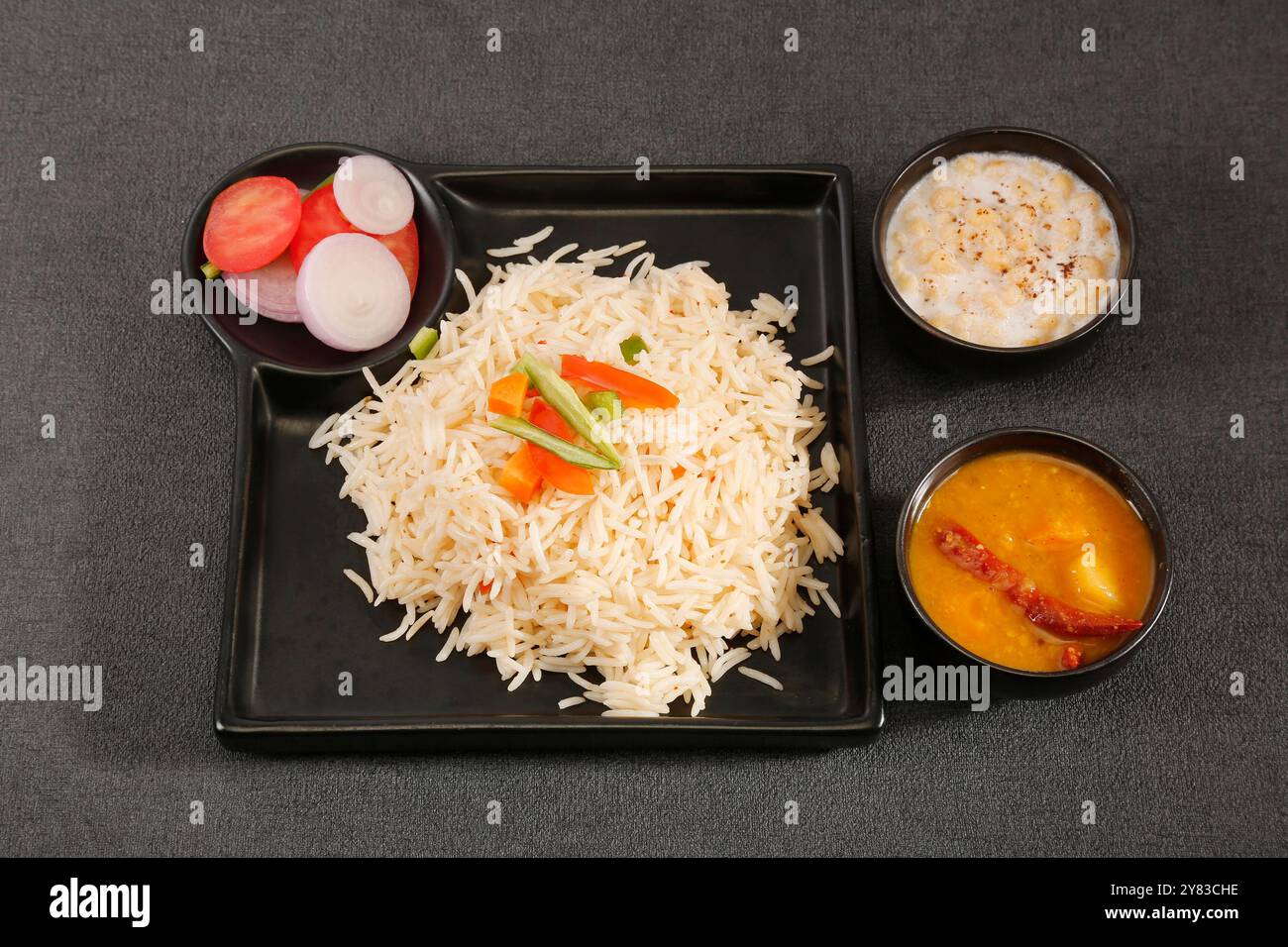 Sambar Rice With Raita, South Indian Dish Stock Photo - Alamy