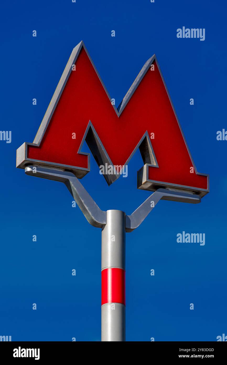 Sign and logo at the entrance to the Moscow Metro. The Moscow ...