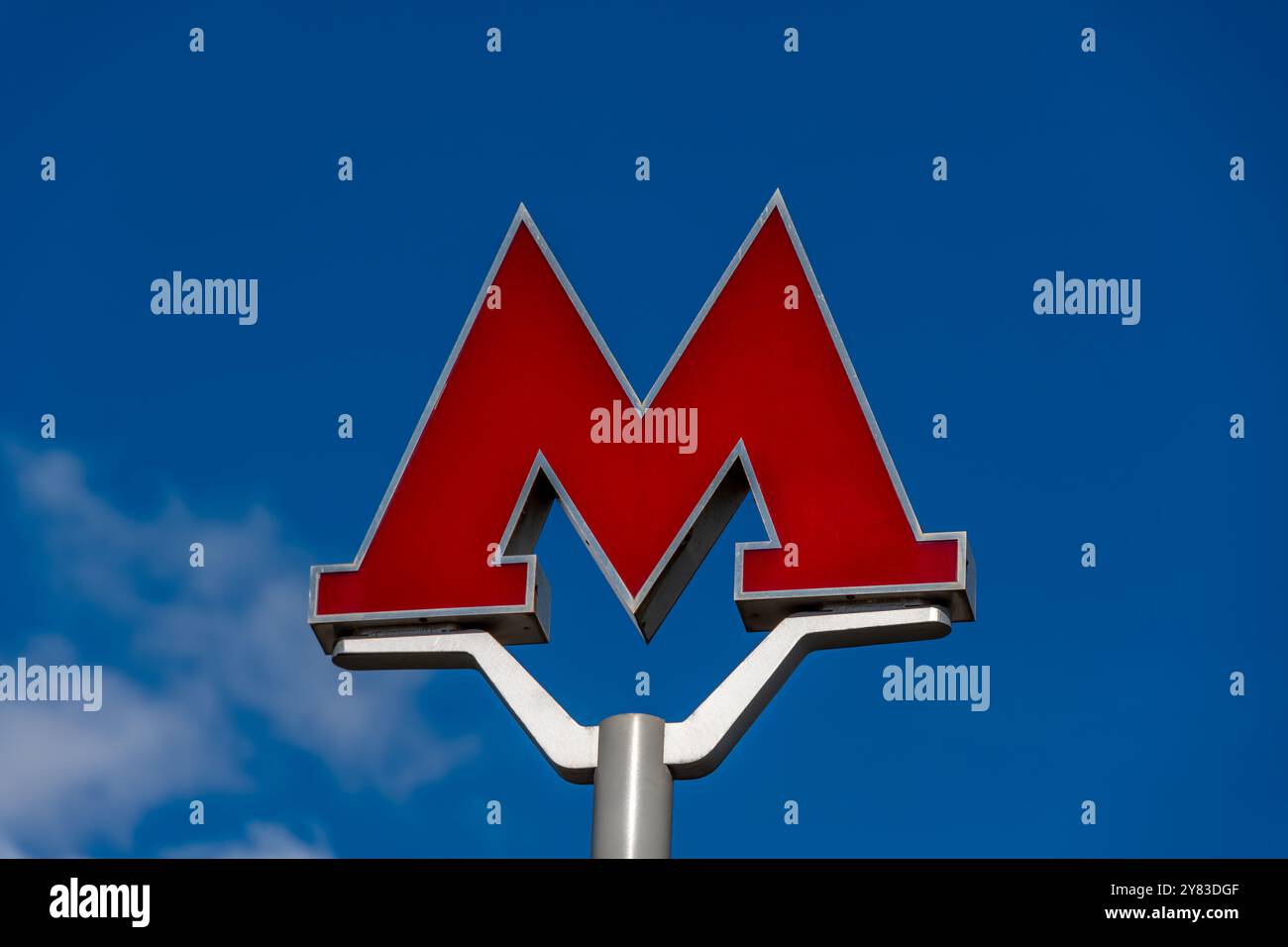 Sign and logo at the entrance to the Moscow Metro. The Moscow ...