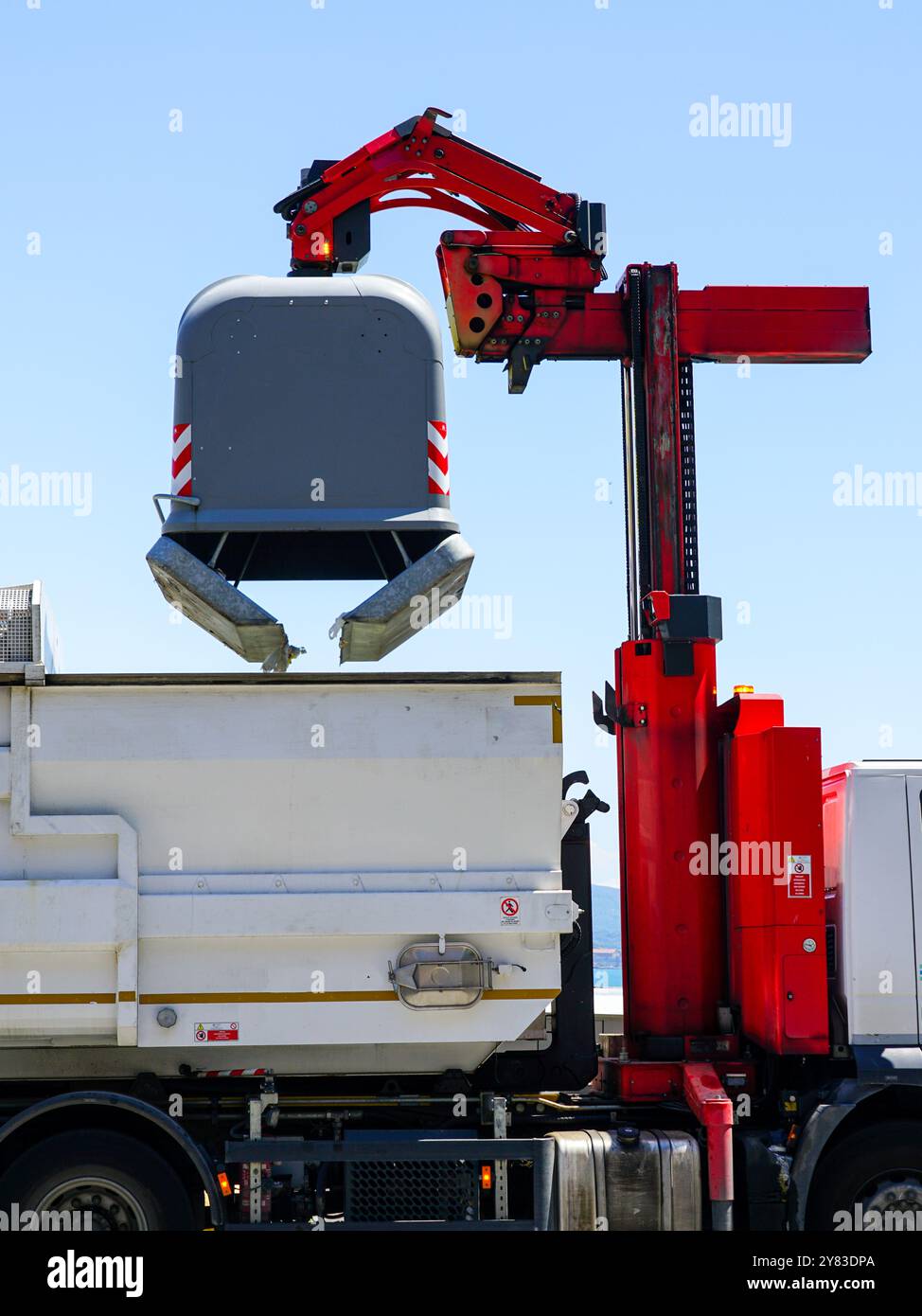 Modern semi-automatic emptying dustbin into waste vehicle, garbage ...