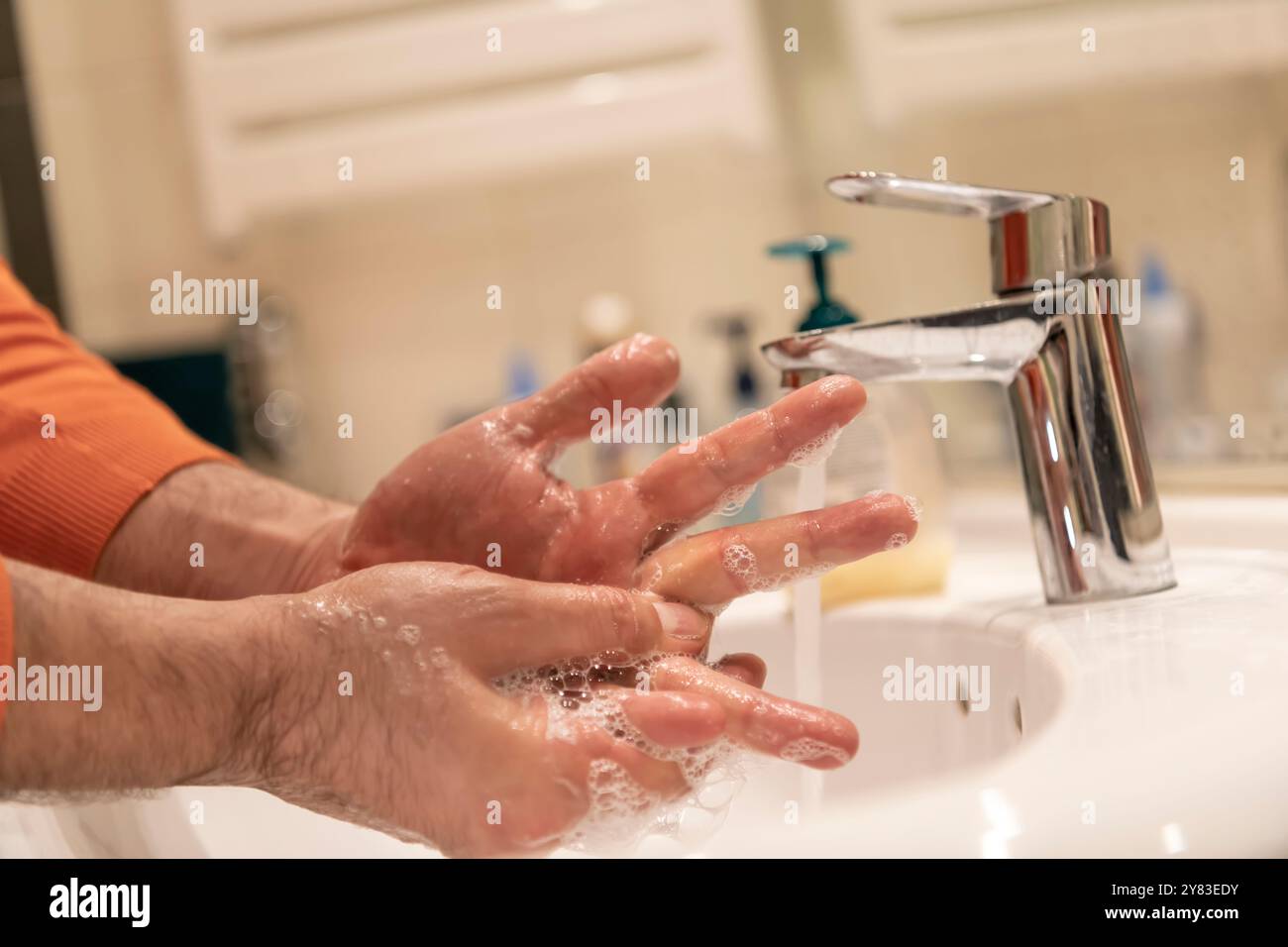 Global Handwashing Day Concept. Washing hands with soap under the water ...