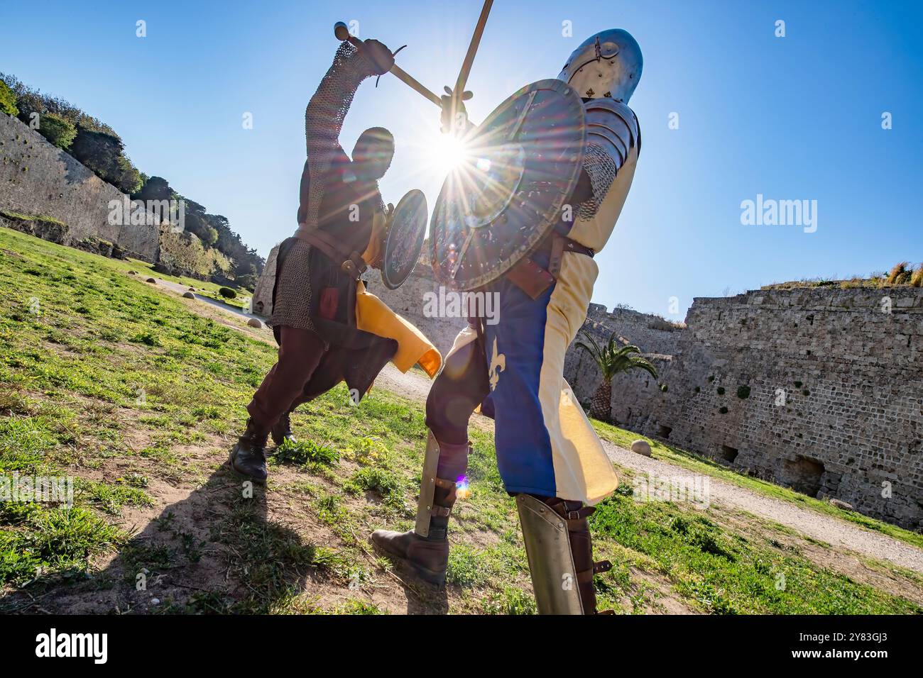 Two medieval knights battle with swords as part of the Rhodes Medieval ...