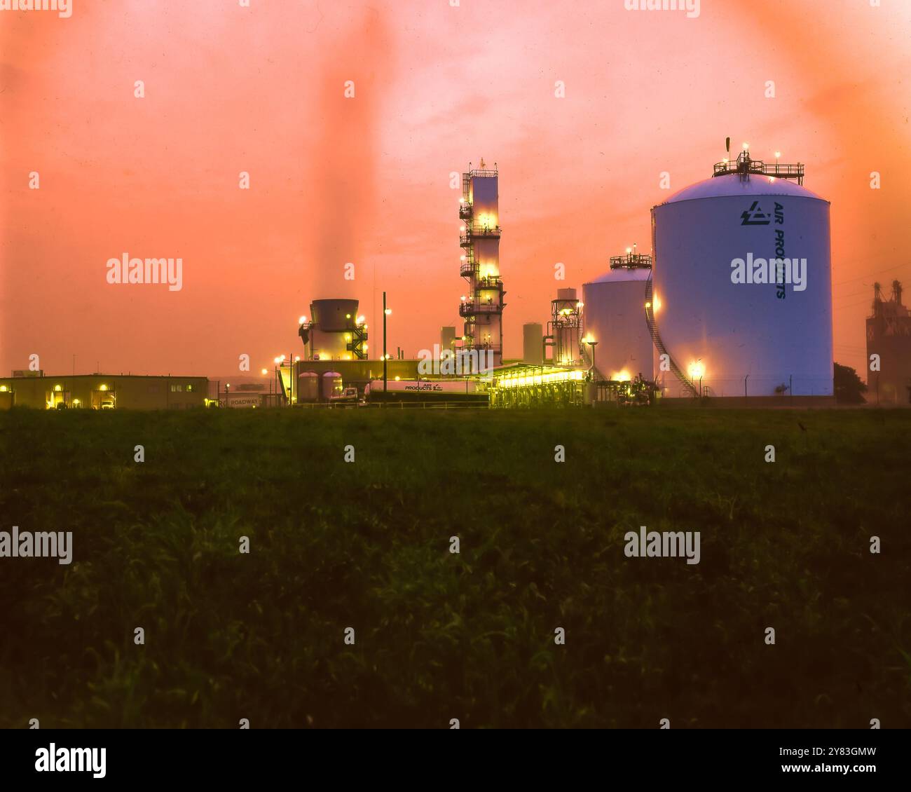 Night time view of natural gas, propane storage, production area Stock ...