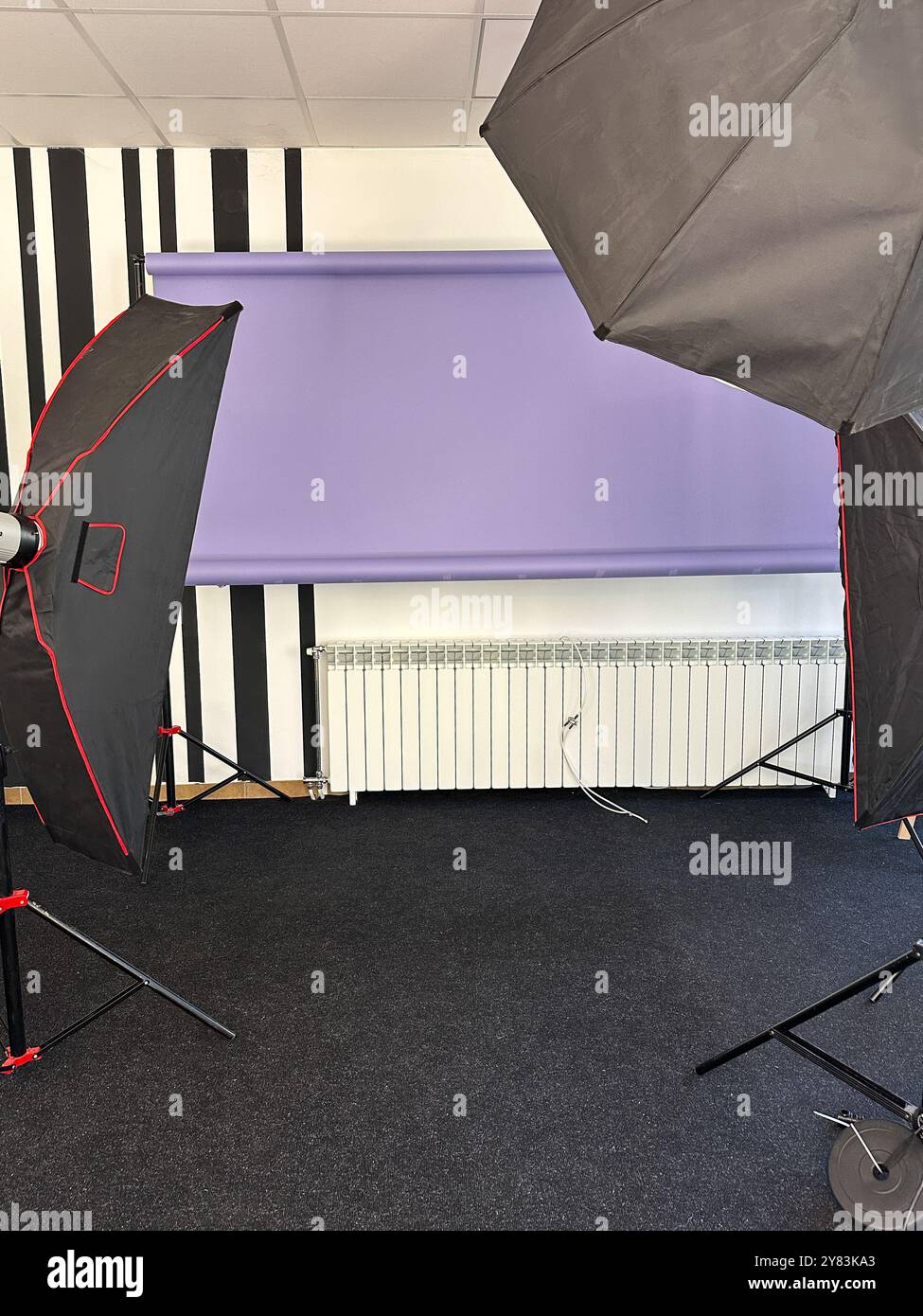 Professional photography studio setup with lighting equipment and a ...