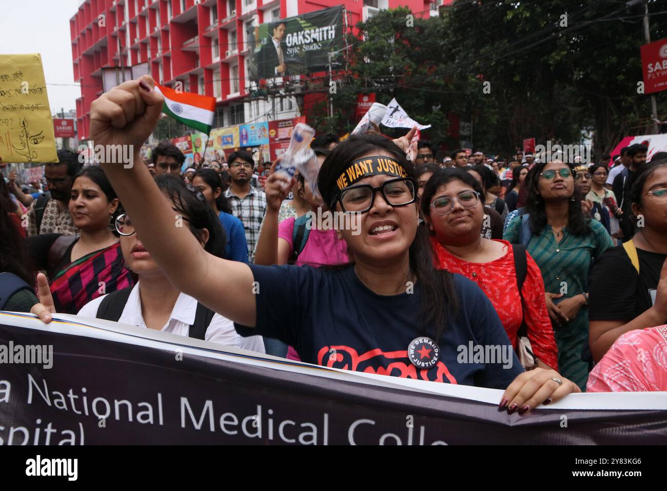 A woman reacts during a demonstration to protest against the rape and ...