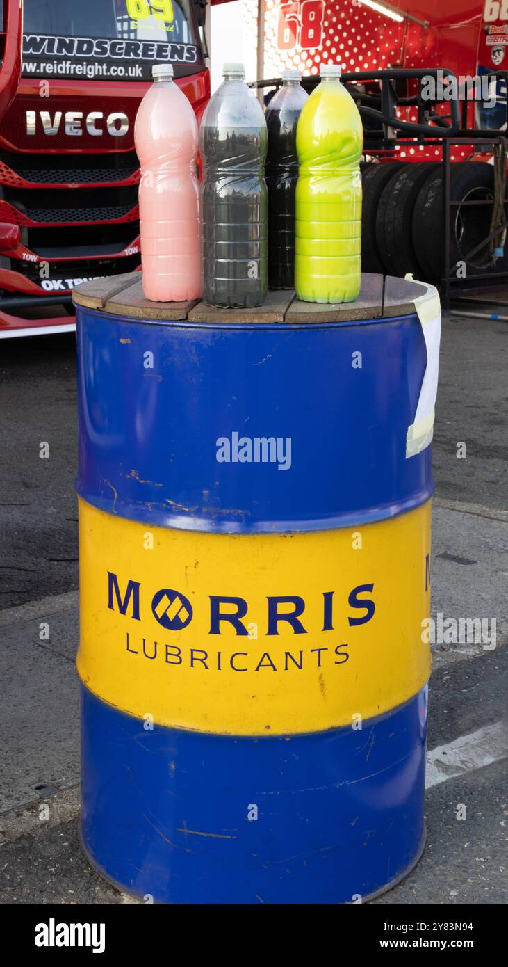 Morris oil barrel with bottles on the top. Paddock area at Snetterton ...
