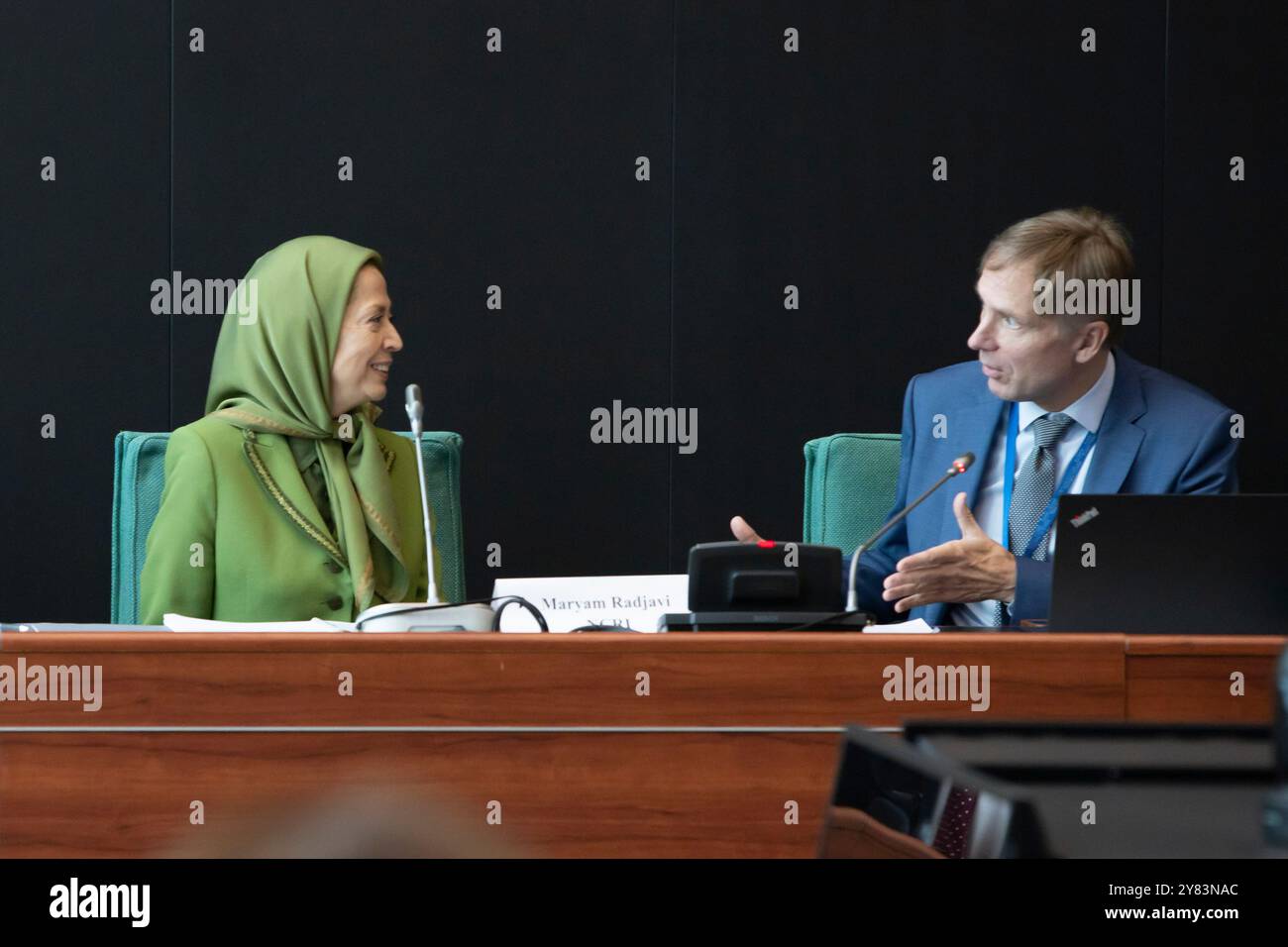 Mrs. Maryam Rajavi speaking to the members of Parliament said, "Hold ...