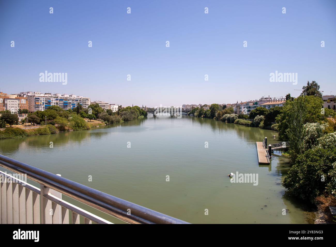 View of the river in city Seville Stock Photo - Alamy