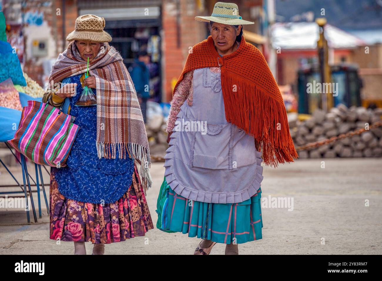 Local Quechua woman wearing traditional dress in Copacabana, Bolivia ...