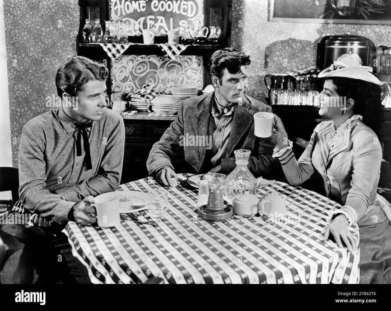Audie Murphy, James Best, Beverly Tyler, on-set of the western film ...