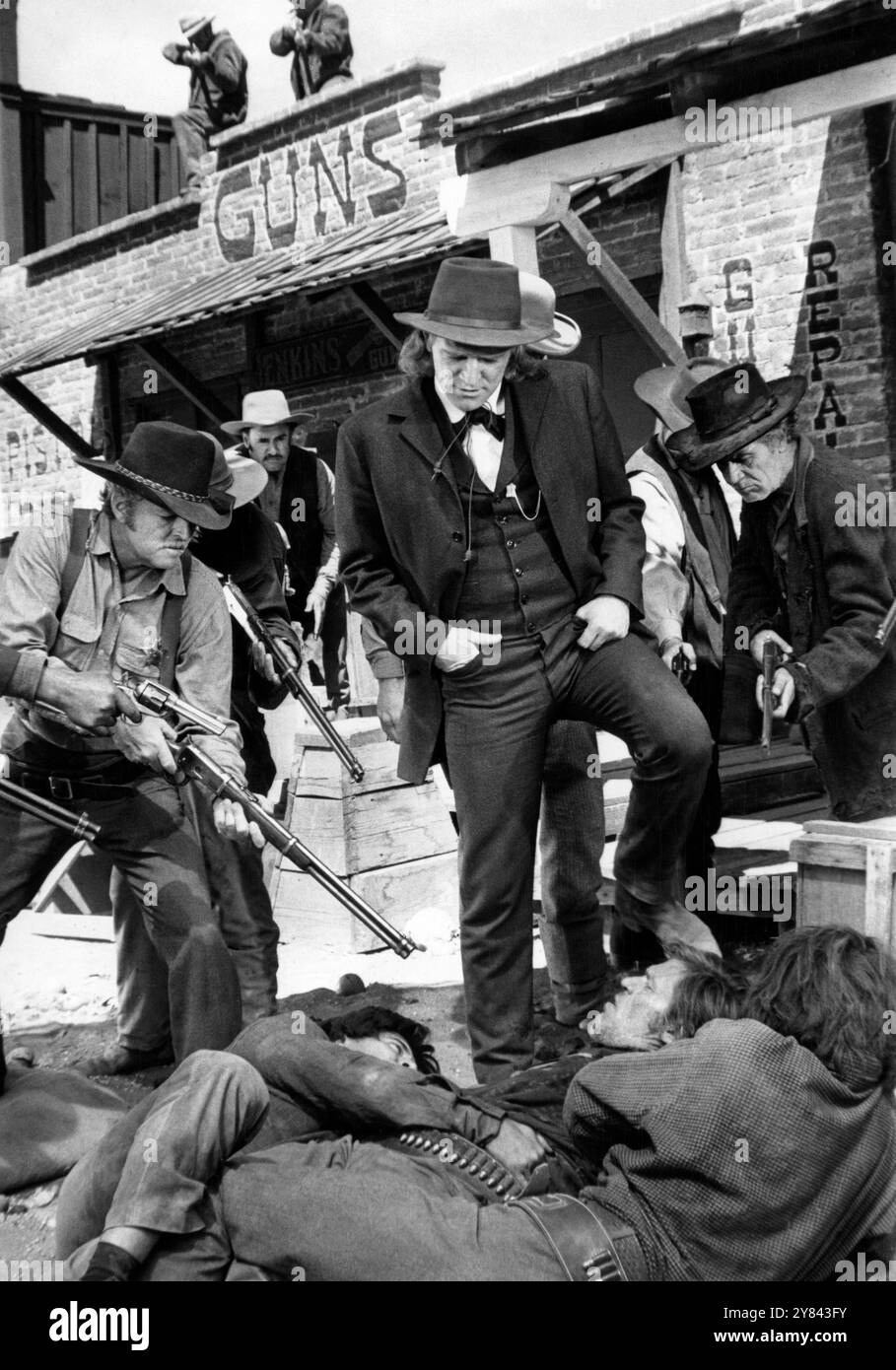 Richard Harris (standing center), on-set of the western film, "The ...