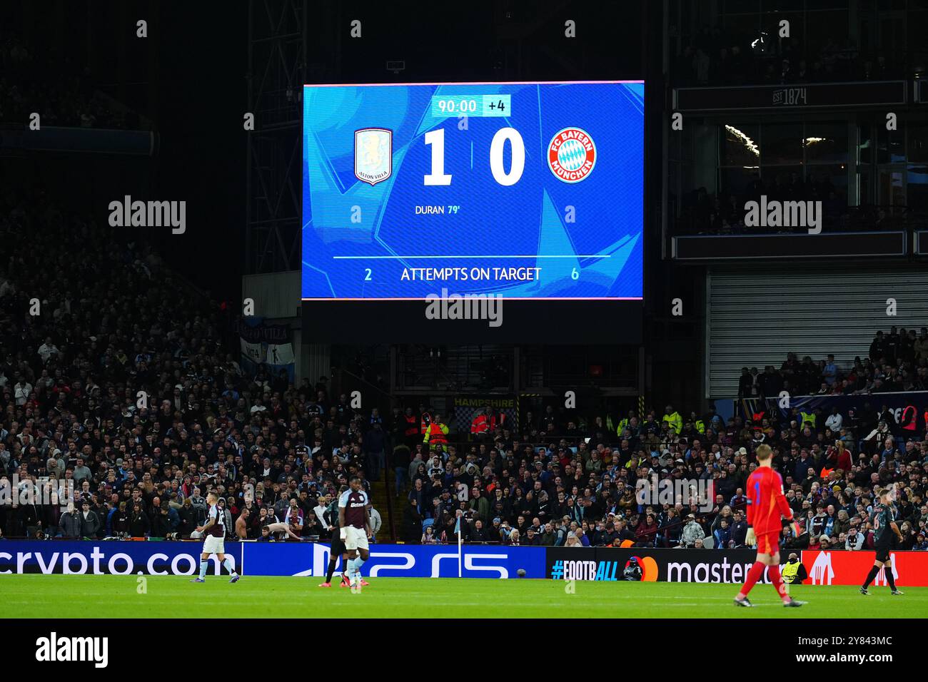The scoreboard showing a 1-0 score line to Aston Villa during the UEFA ...