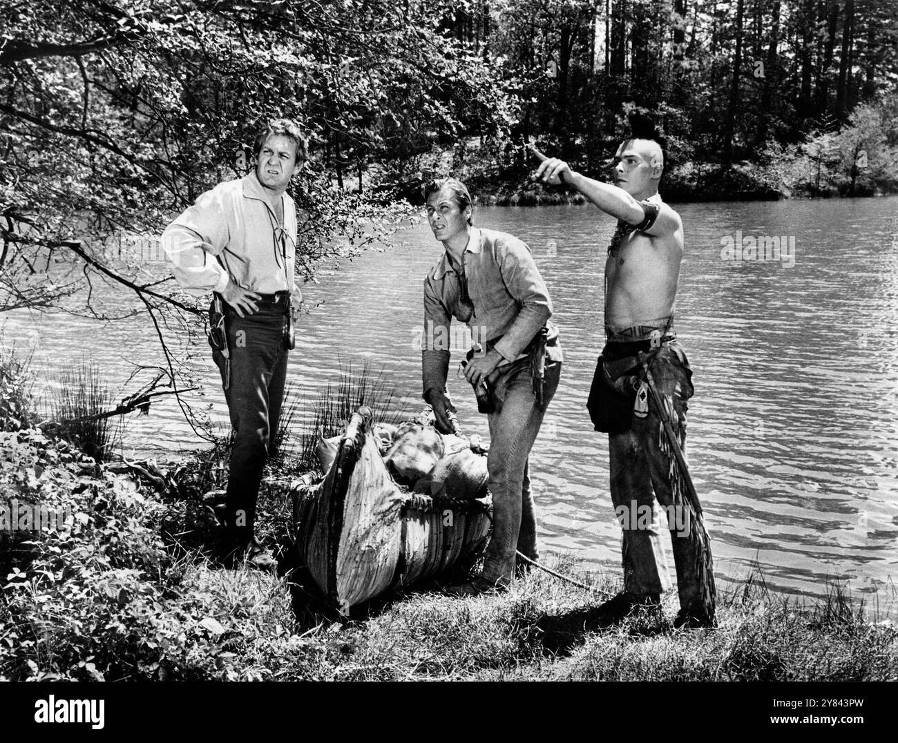 Forrest Tucker, Lex Barker, Carlos Rivas, on-set of the western film ...