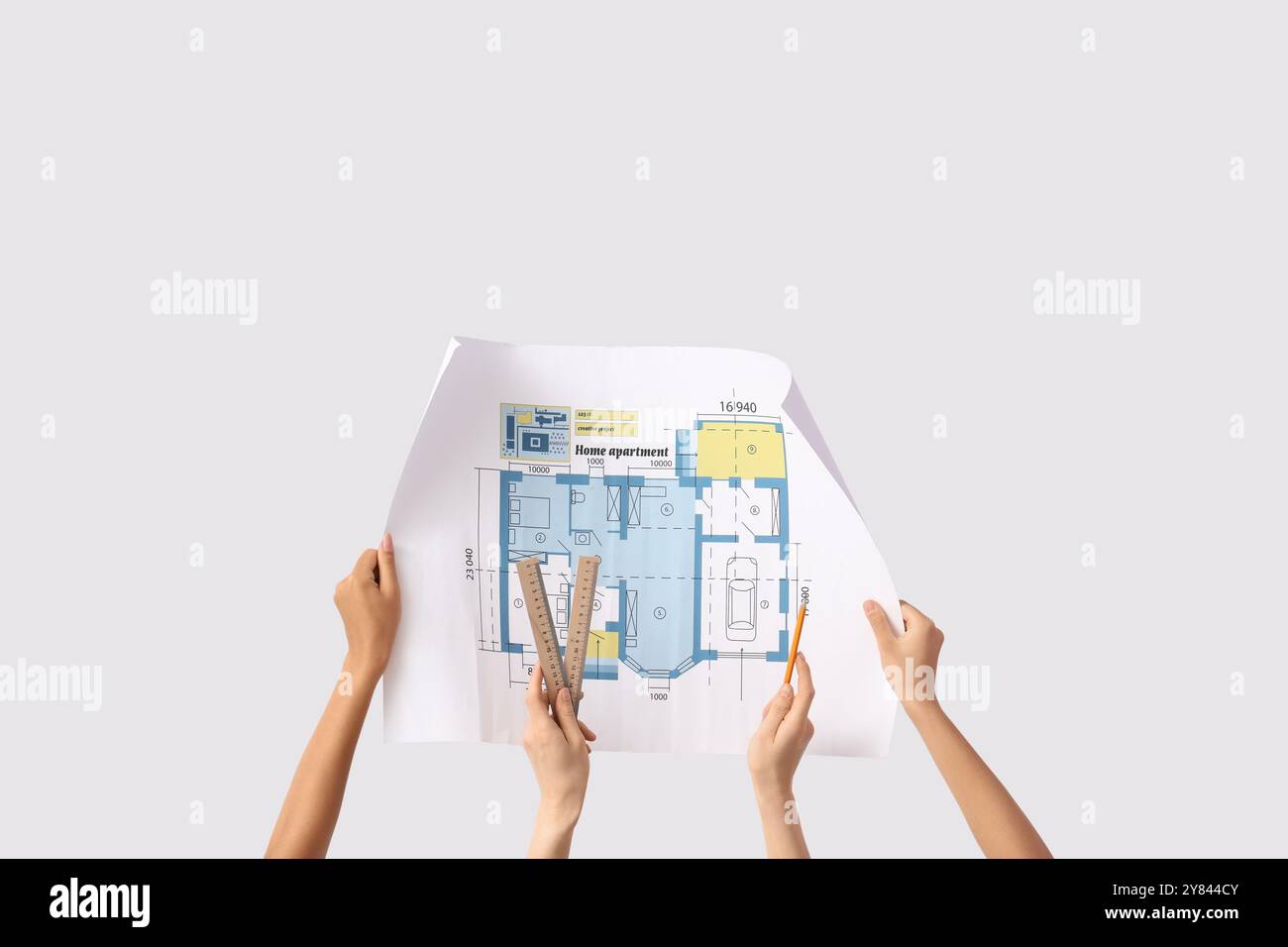 Architects with house plan, rulers and pencil on light background Stock ...