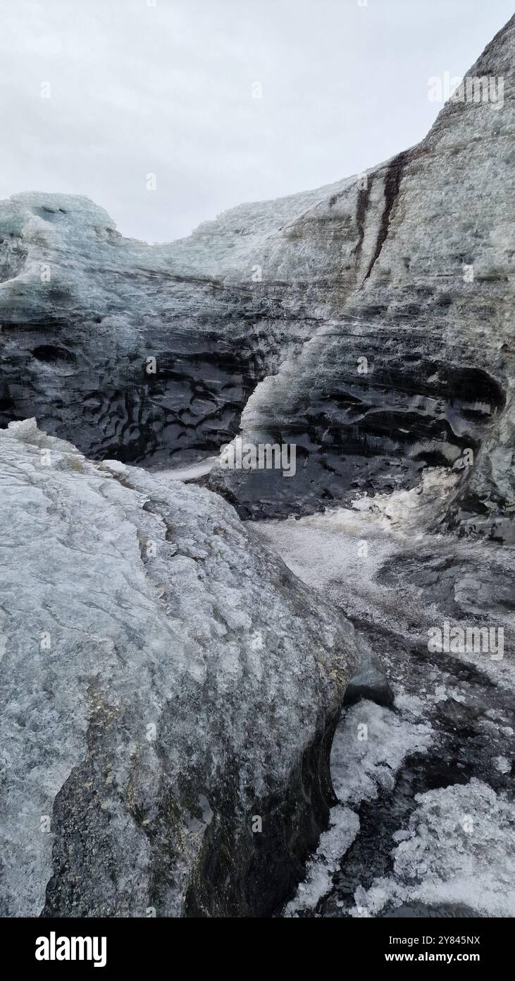 Inside of vatnajokull glacier ice caves with cracked structure of ice ...