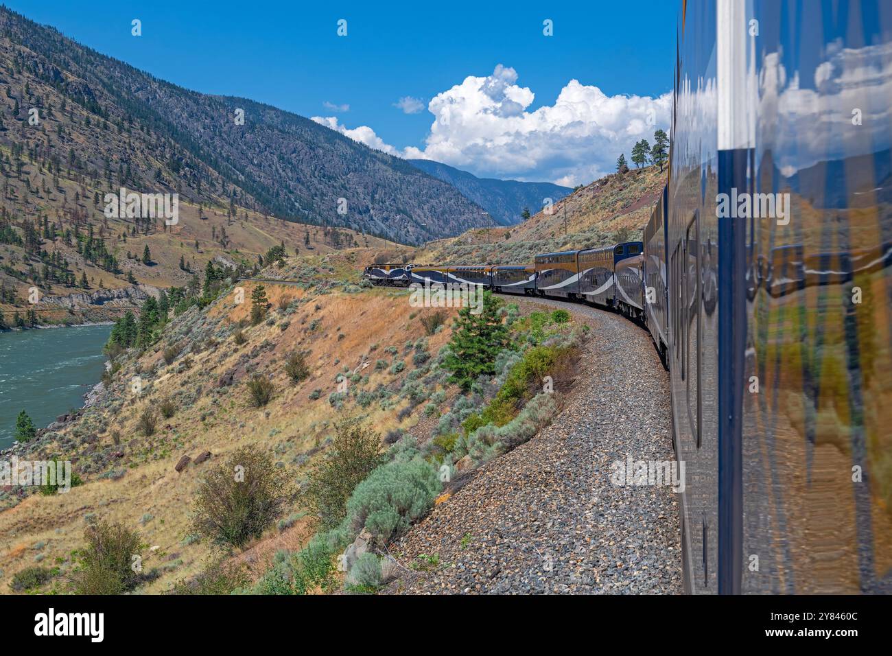 Rocky Mountaineer train by Fraser River between Vancouver and Kamloops ...