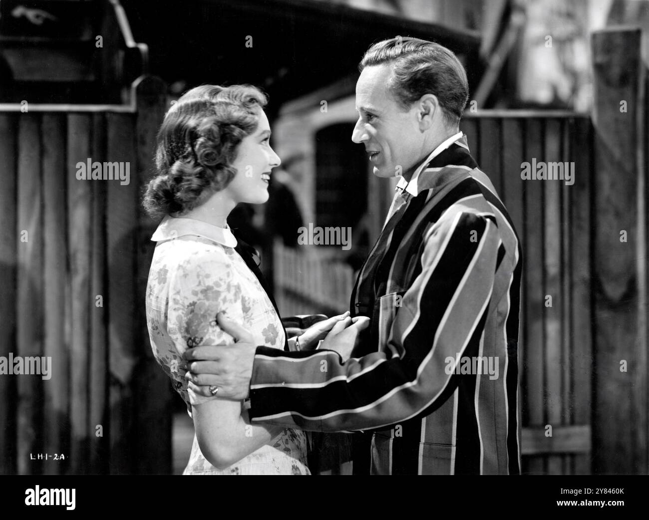 ROSAMUND JOHN and LESLIE HOWARD as R.J. Mitchell in THE FIRST OF THE ...