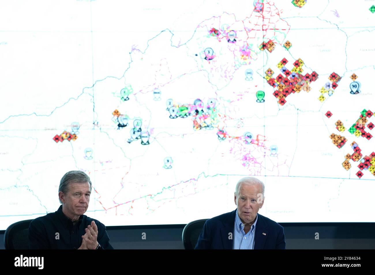 President Joe Biden speaks with Gov. Roy Cooper, D-N.C., as he visits ...