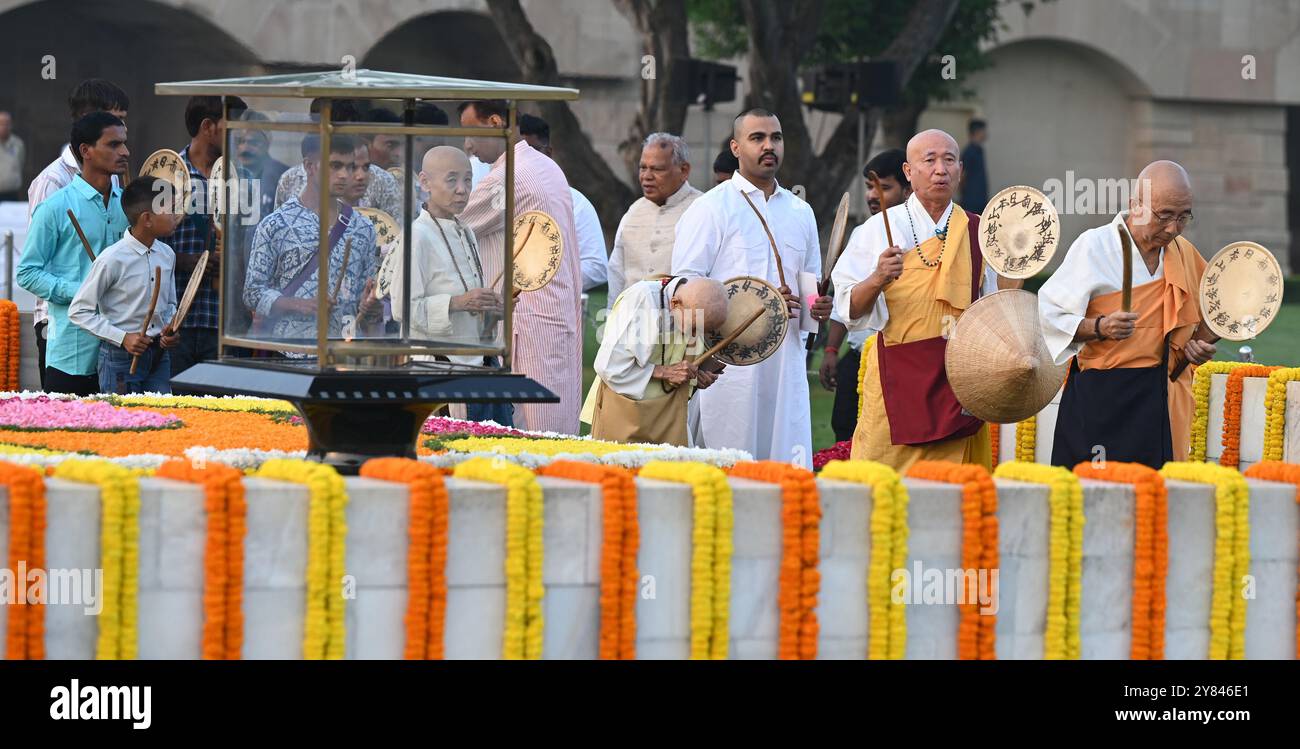 NEW DELHI, INDIA - OCTOBER 2: Buddha Monks pay tribute to Mahatma ...