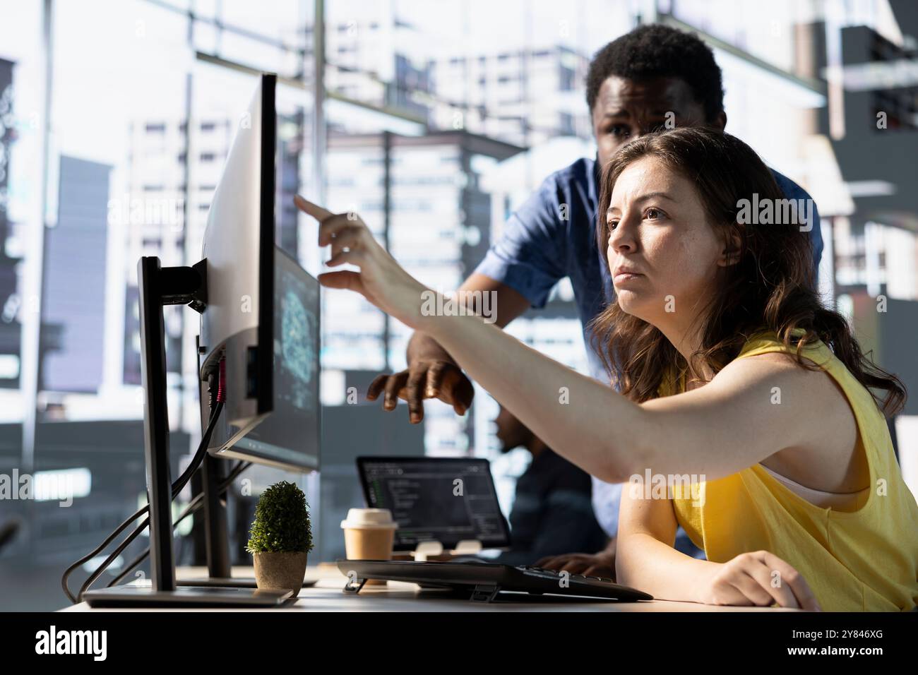 Focused employee analyzing datasets hi-res stock photography and images ...