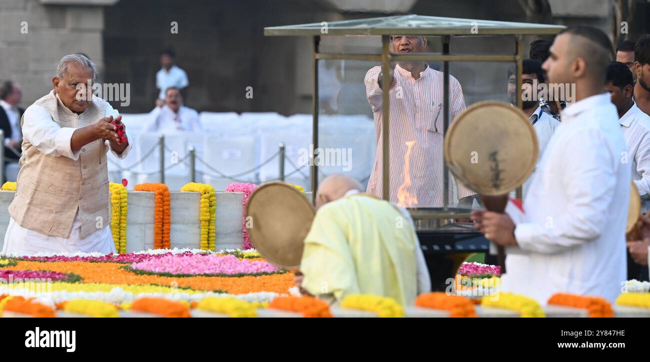 NEW DELHI, INDIA - OCTOBER 2: Buddha Monks pay tribute to Mahatma Gandhi on his 155th birth ...