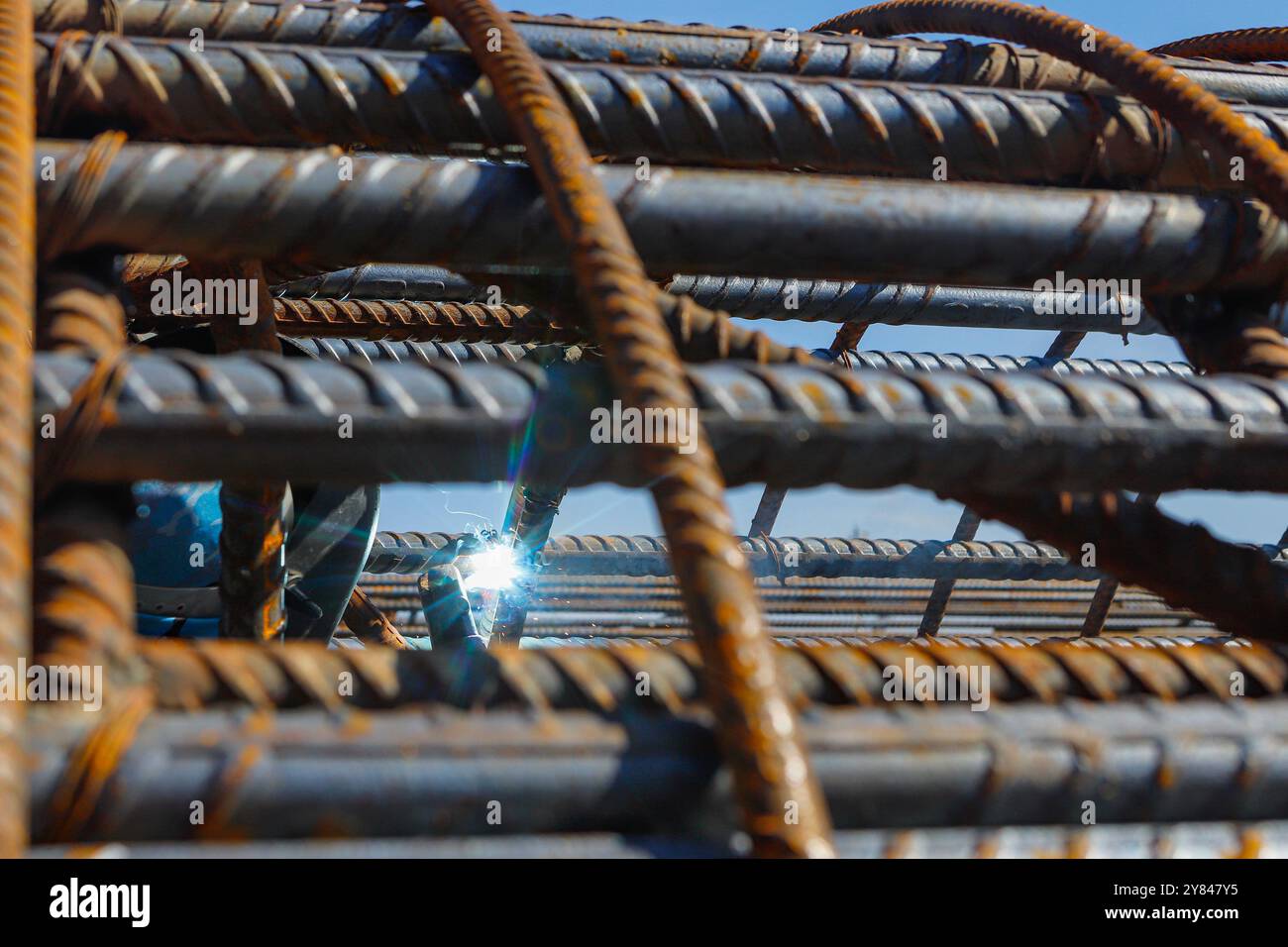 Reinforced iron lines and in the background a point of light coming ...