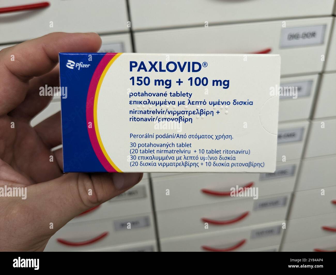 Paxlovid box of medication with active substance Nirmatrelvir and ...
