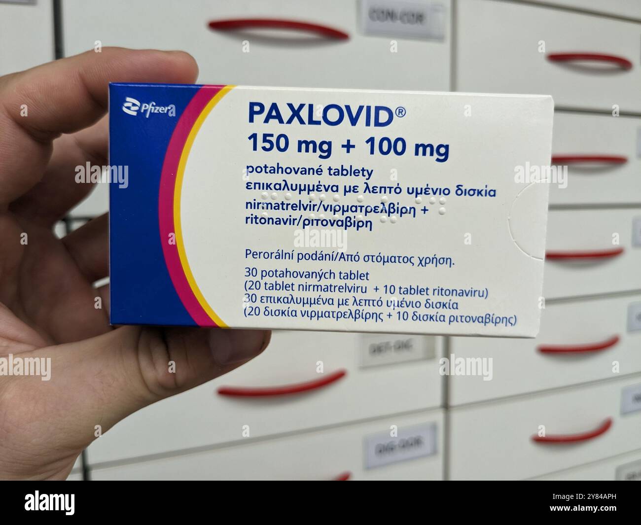 Paxlovid box of medication with active substance Nirmatrelvir and ...