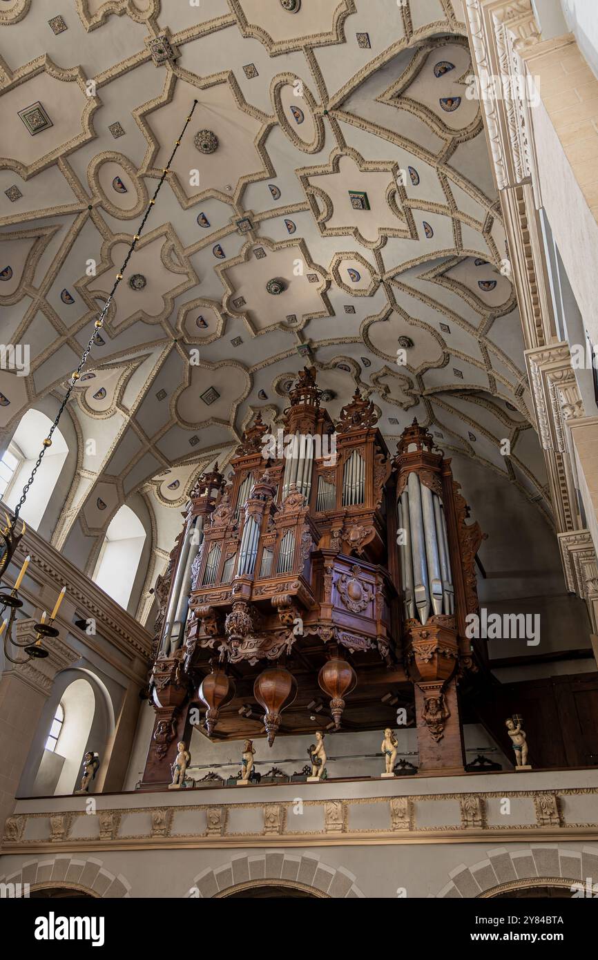 Discover the beauty of this ornate pipe organ located in a historic ...