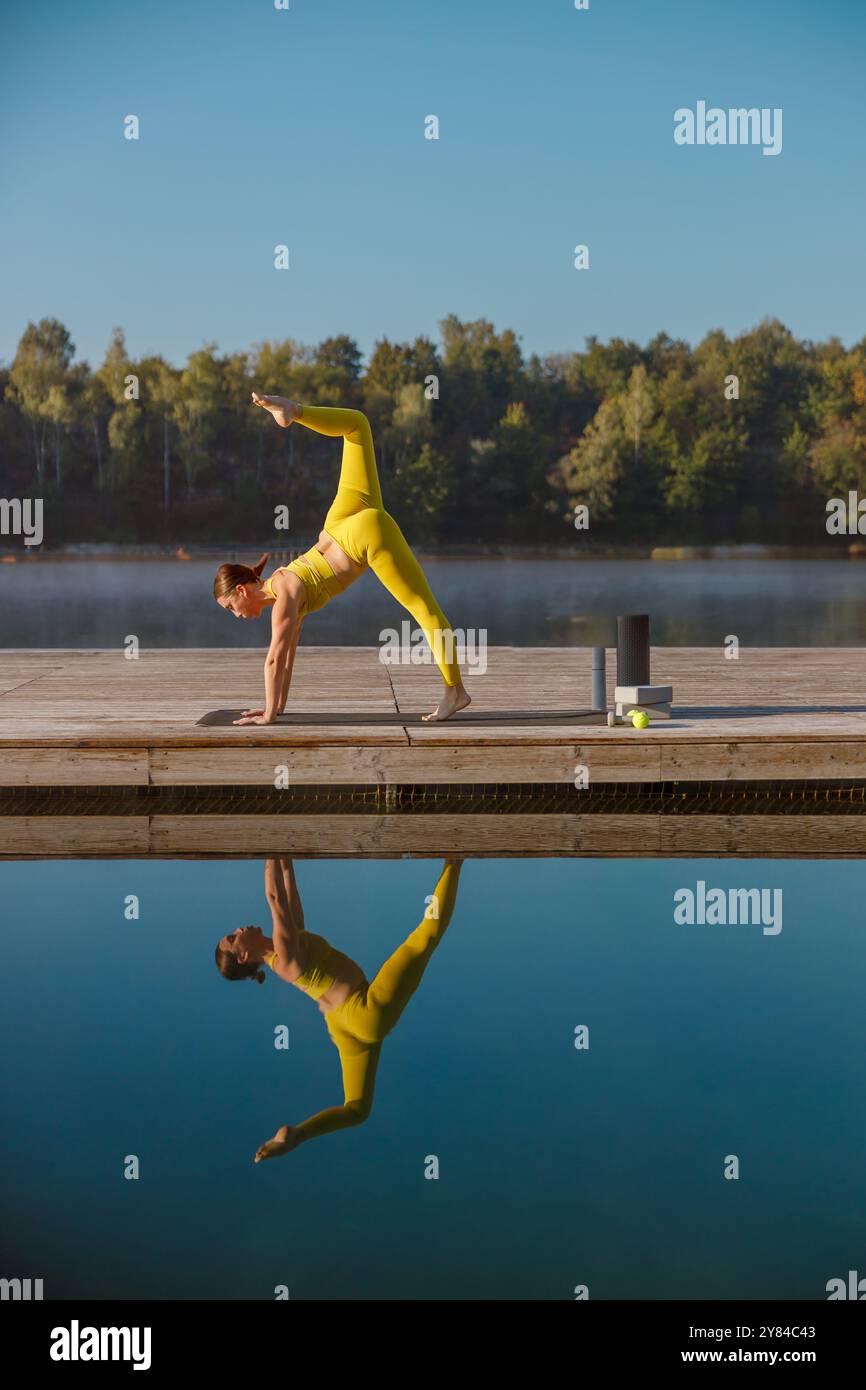 Engaging in Yoga Poses by the Water A Journey of Serenity, Calmness ...