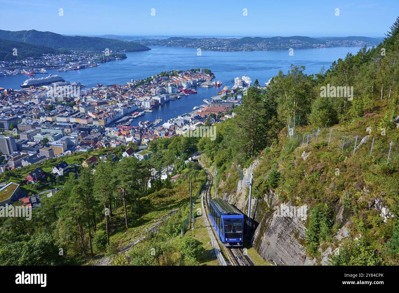Panoramic view of Bergen with harbour on a clear day, cable car ...